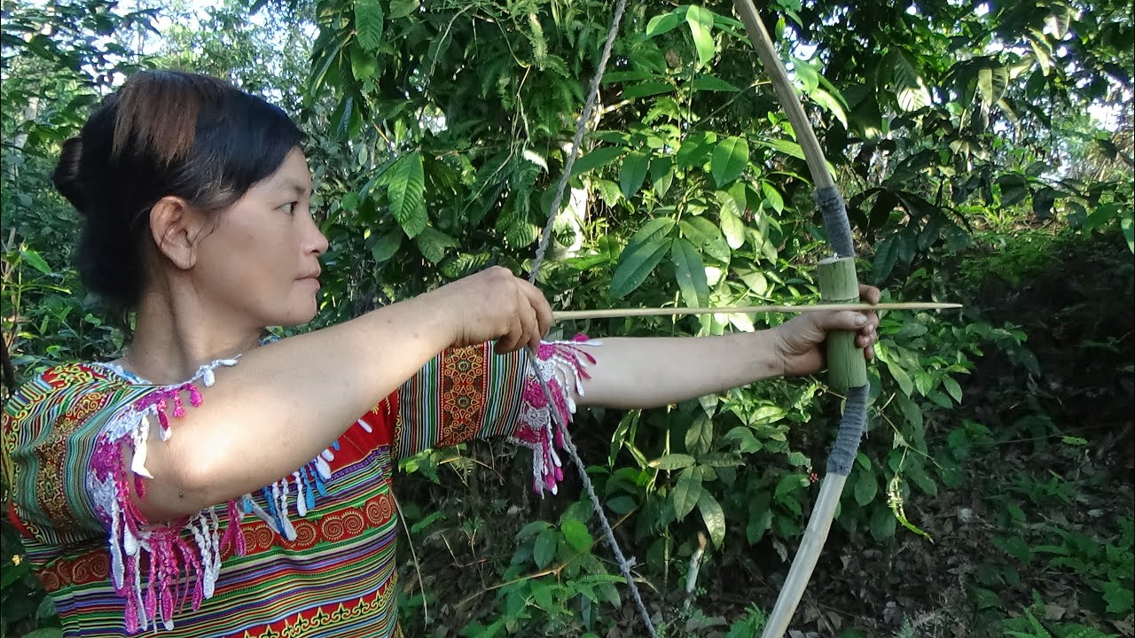 Primitive Life - Ethnic Girl Made A Bow And Arrow To Survive ...
