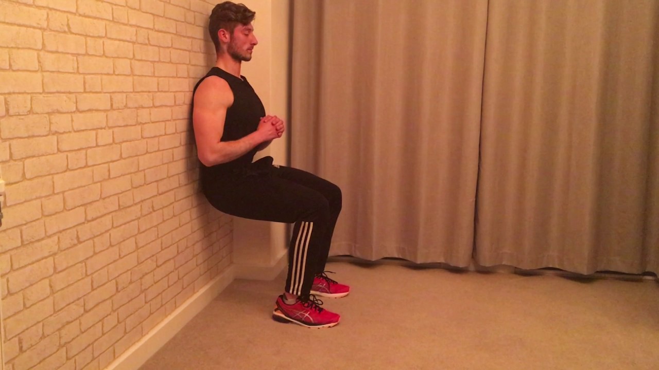 wall squat hold - YouTube