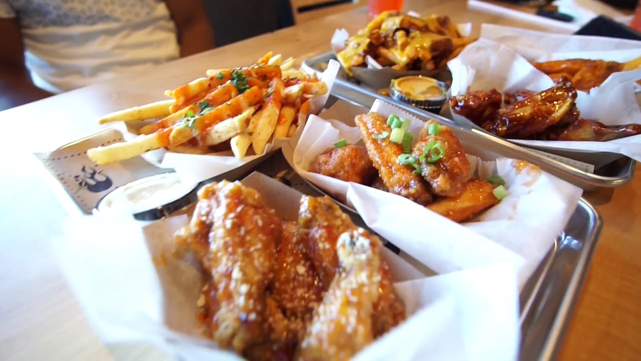 trying out Fire Wings for the FIRST time! [FEATUREDBITES] - YouTube