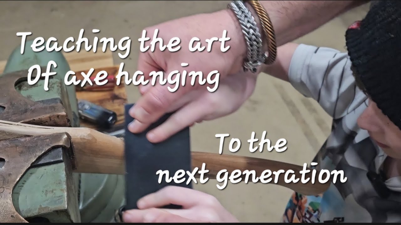 Teaching the art of axe hanging to the next generation. - YouTube