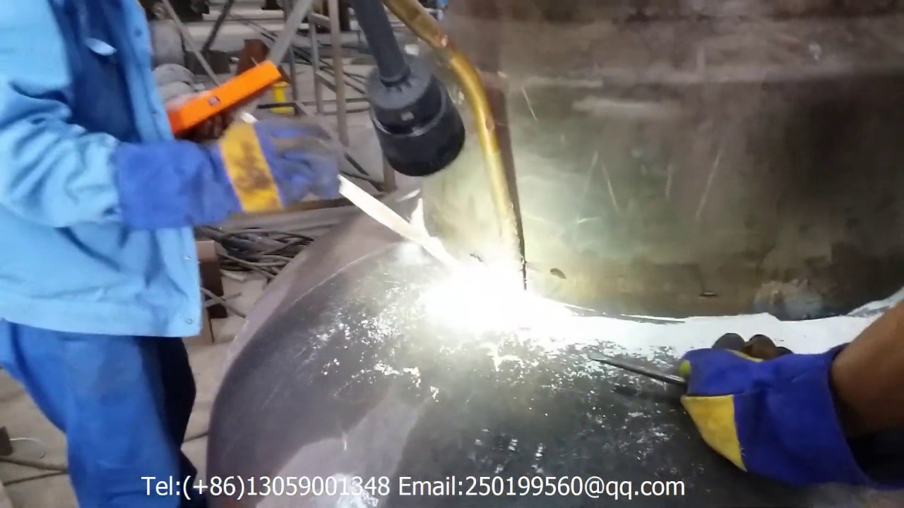 Submerged arc welding of Nozzle welding for Stainless steel Tank Heads ...