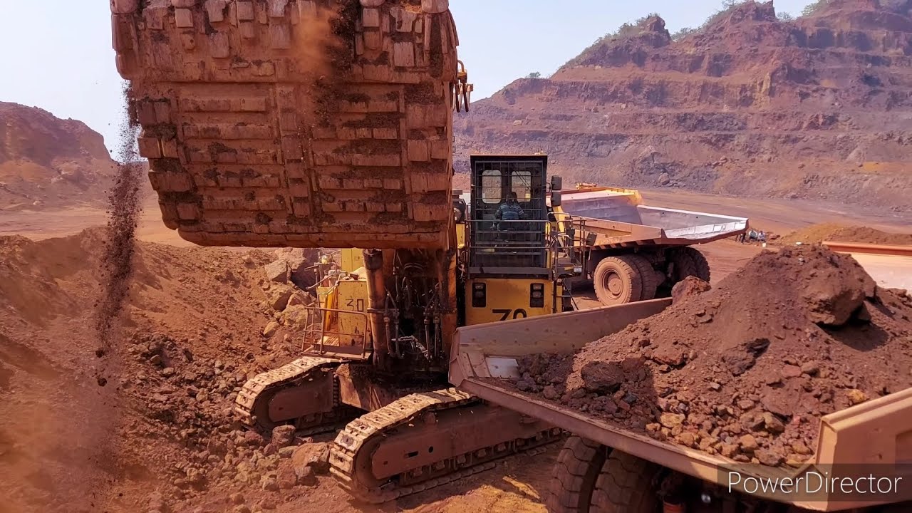 KOMATSU PC 2000 SHOVEL LOADING CAT 777D & KOMATSU HD 785 - YouTube