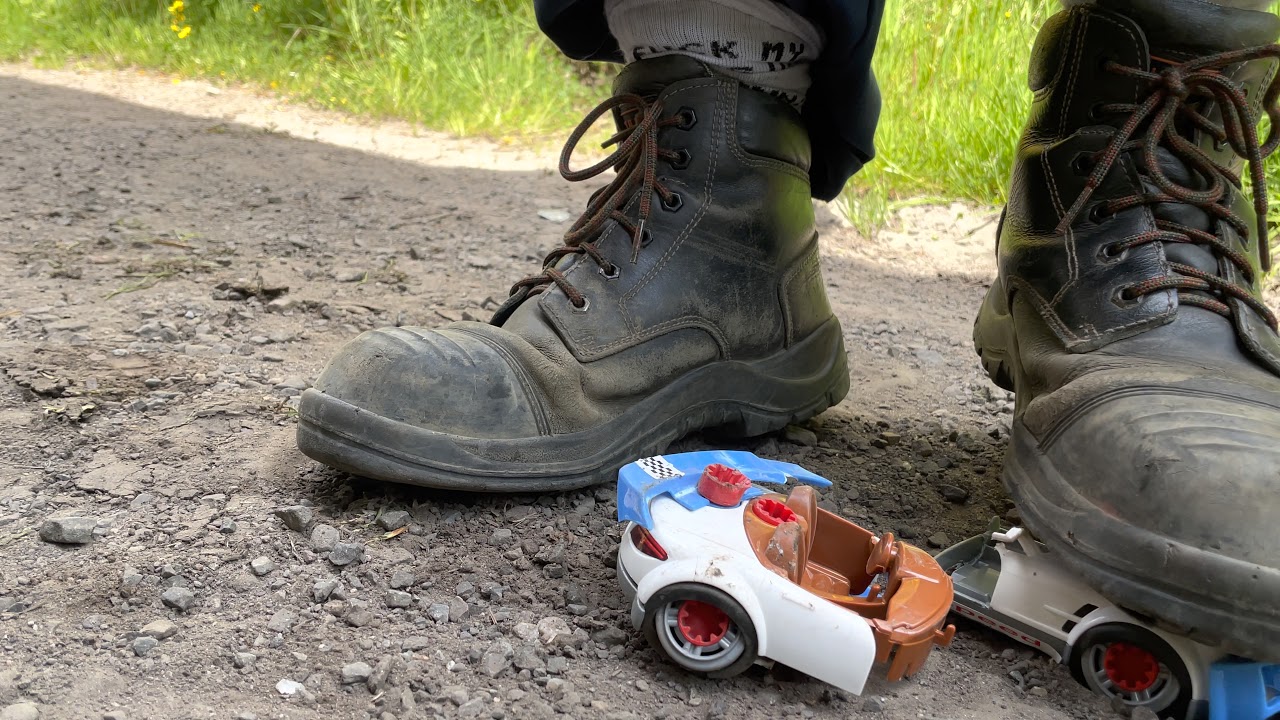 Work boots crushing a toy car - YouTube