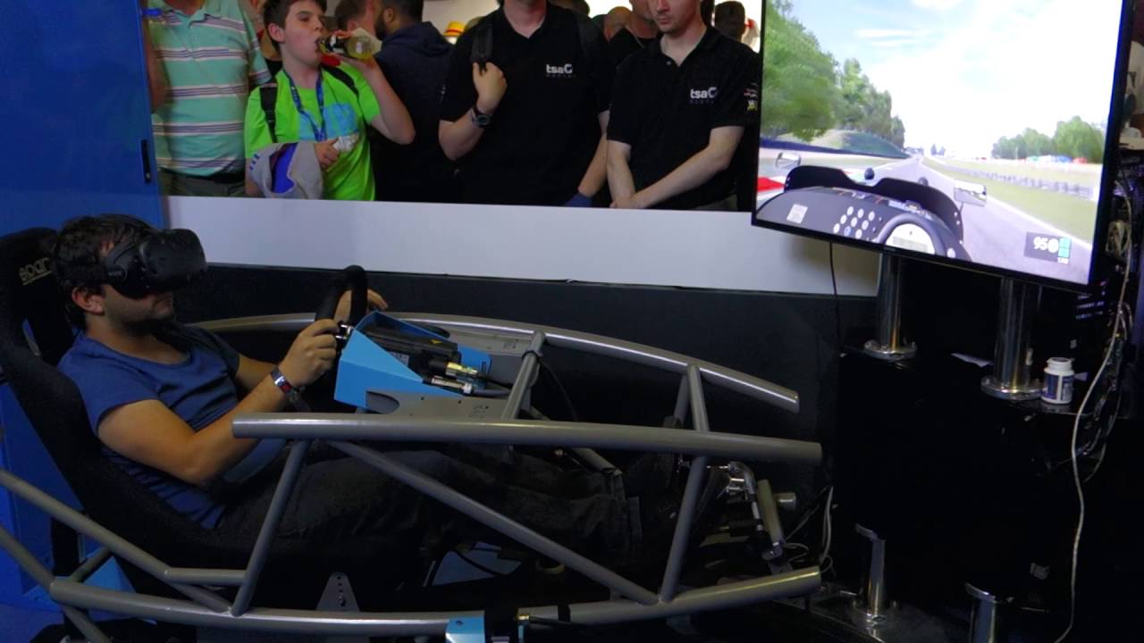 EGX 2016 - 3XS Systems RAID Full Motion Racing Simulator - YouTube