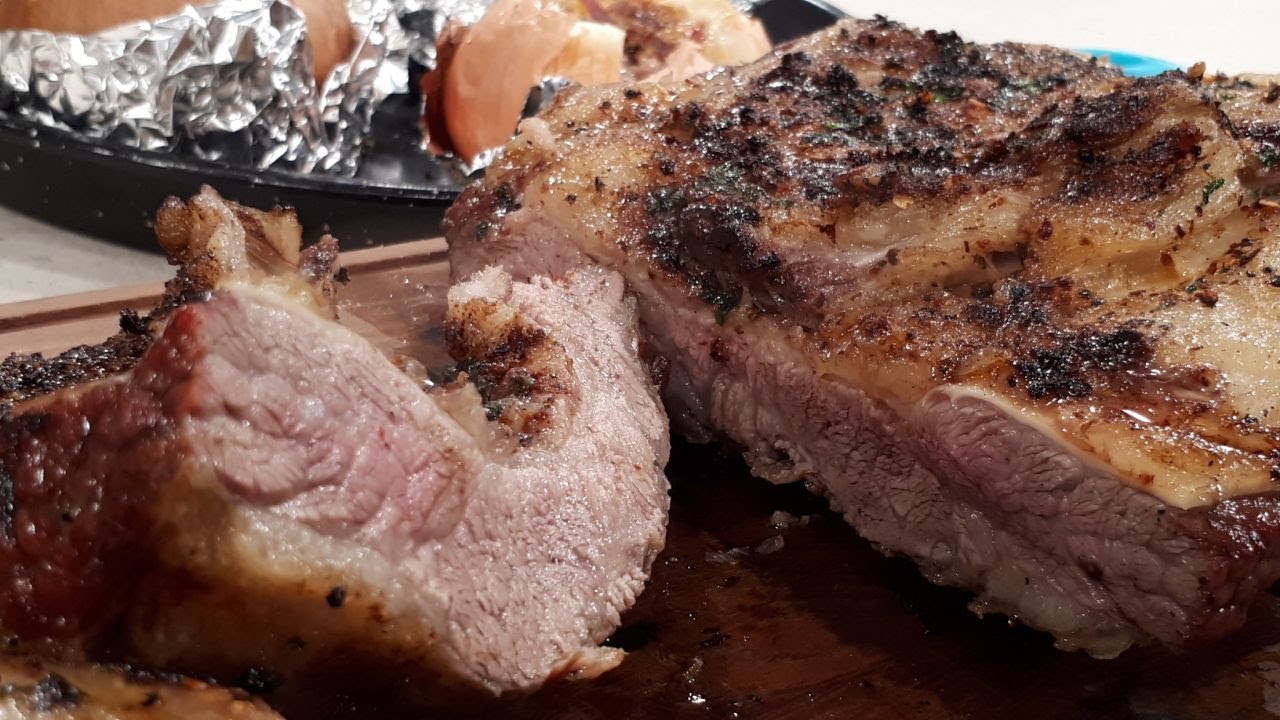 Falda a la parrilla con cebollas rellenas - YouTube