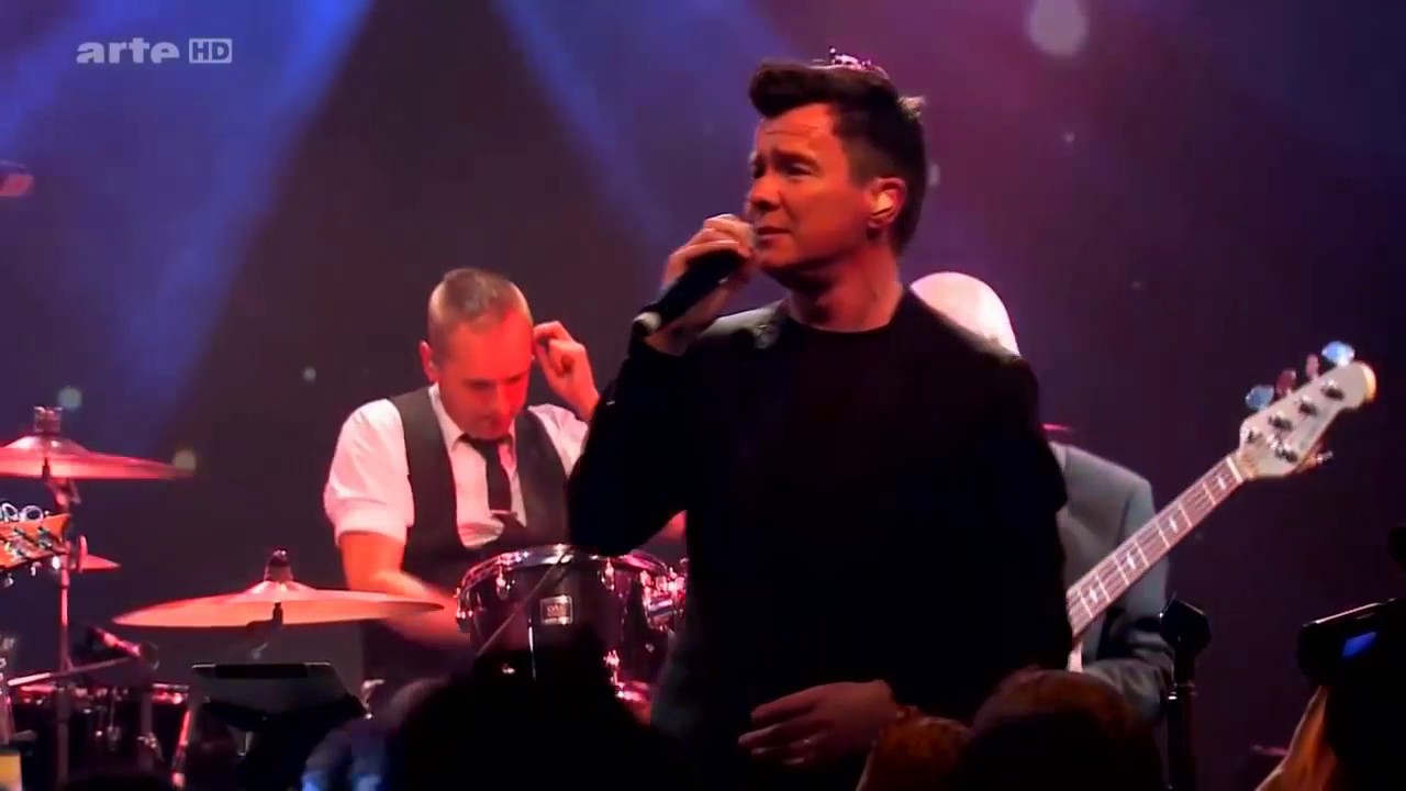 Rick Astley-Keep Singing (Live) - YouTube