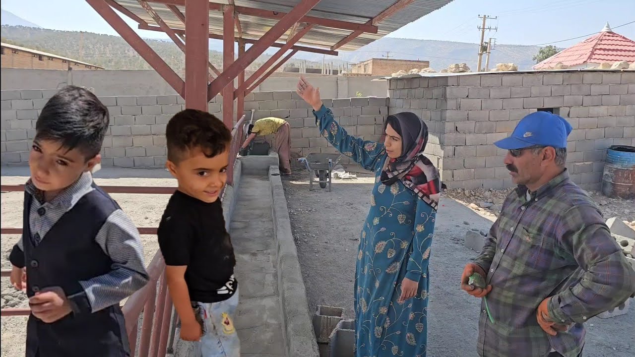 Tayyiba's heavy work despite her physical weakness.Installing a cattle ...