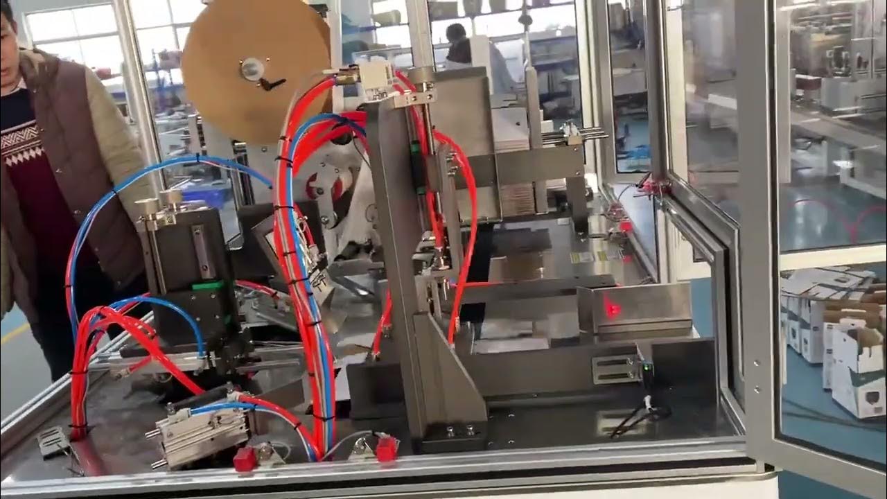 Automatic box folding machine - YouTube