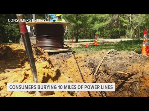 Consumers Energy crews working to bury power lines in West Michigan - YouTube