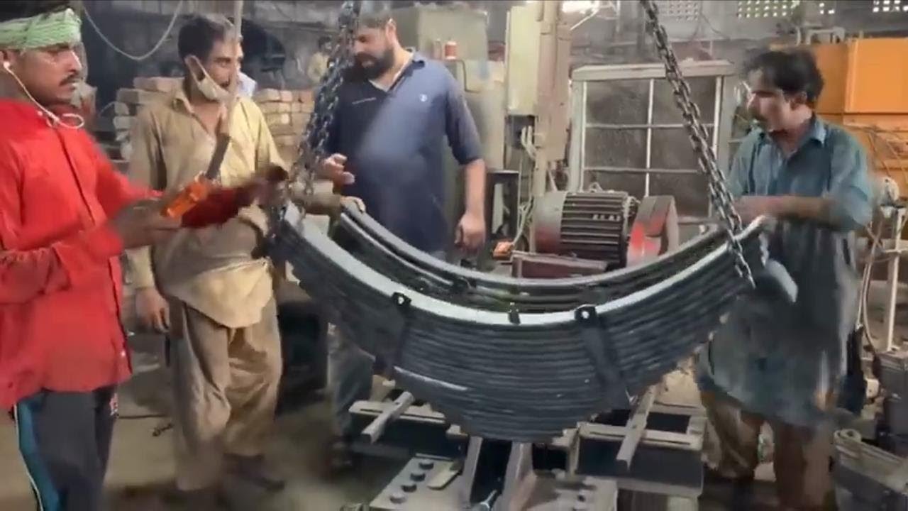 Amazing leaf spring production process in the factory. Manufacturing of ...