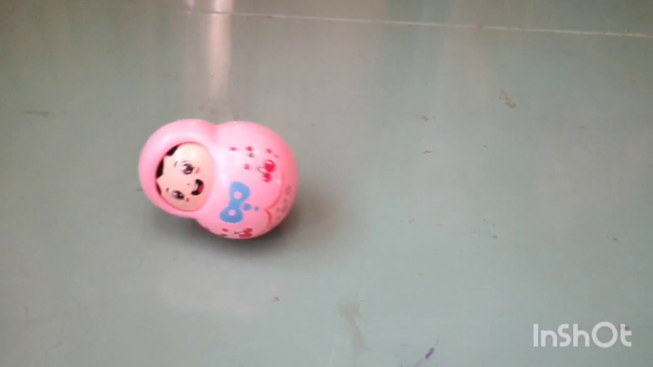 Doll that never falls/gravity doll - YouTube