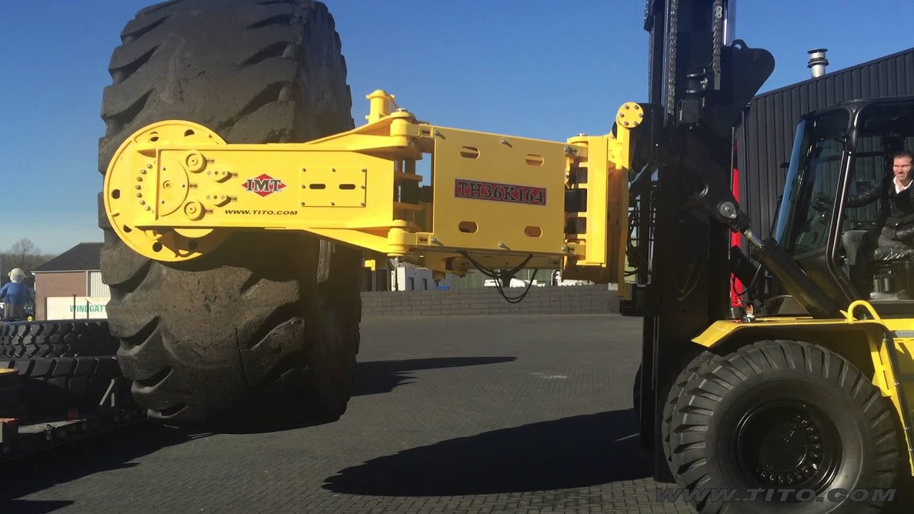 tito.com // handling a haul truck tire with a Hyster Tire Handler - YouTube