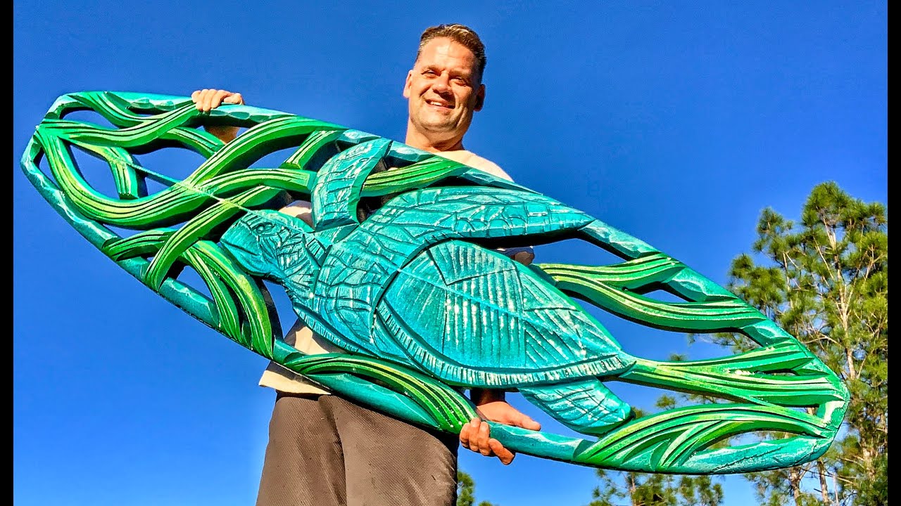 Naples artist Jake Jones carves reclaimed surfboards into art - YouTube