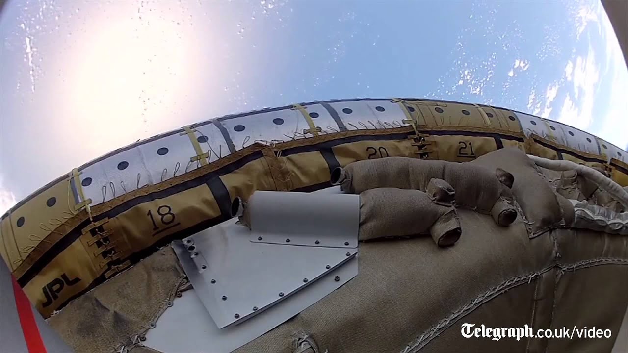 Nasa's tests 'flying saucer' for Mars missons - YouTube