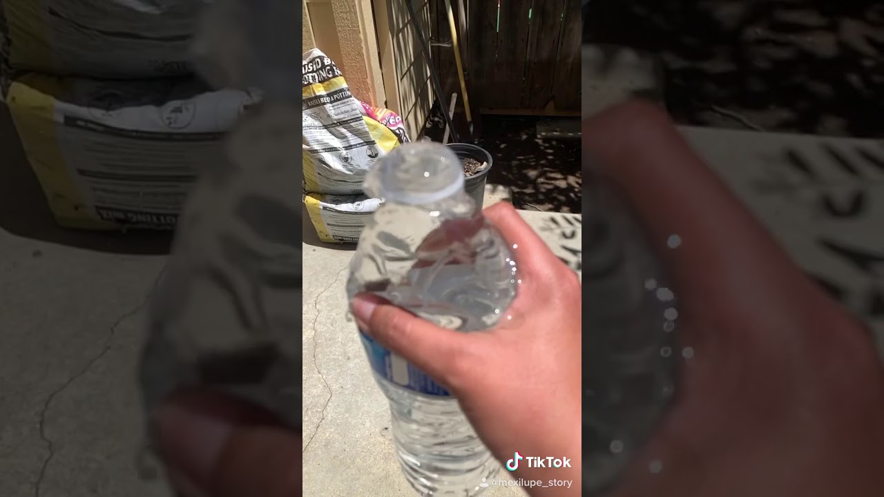 Slow motion water bottle - YouTube