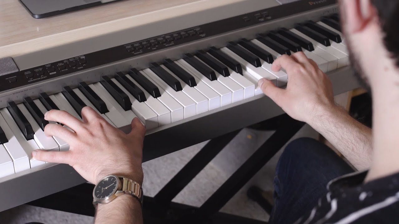 A Musician Playing A Digital Keyboard Instrument - YouTube