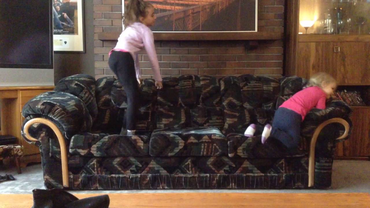 My two little sisters jumping off the couch - YouTube