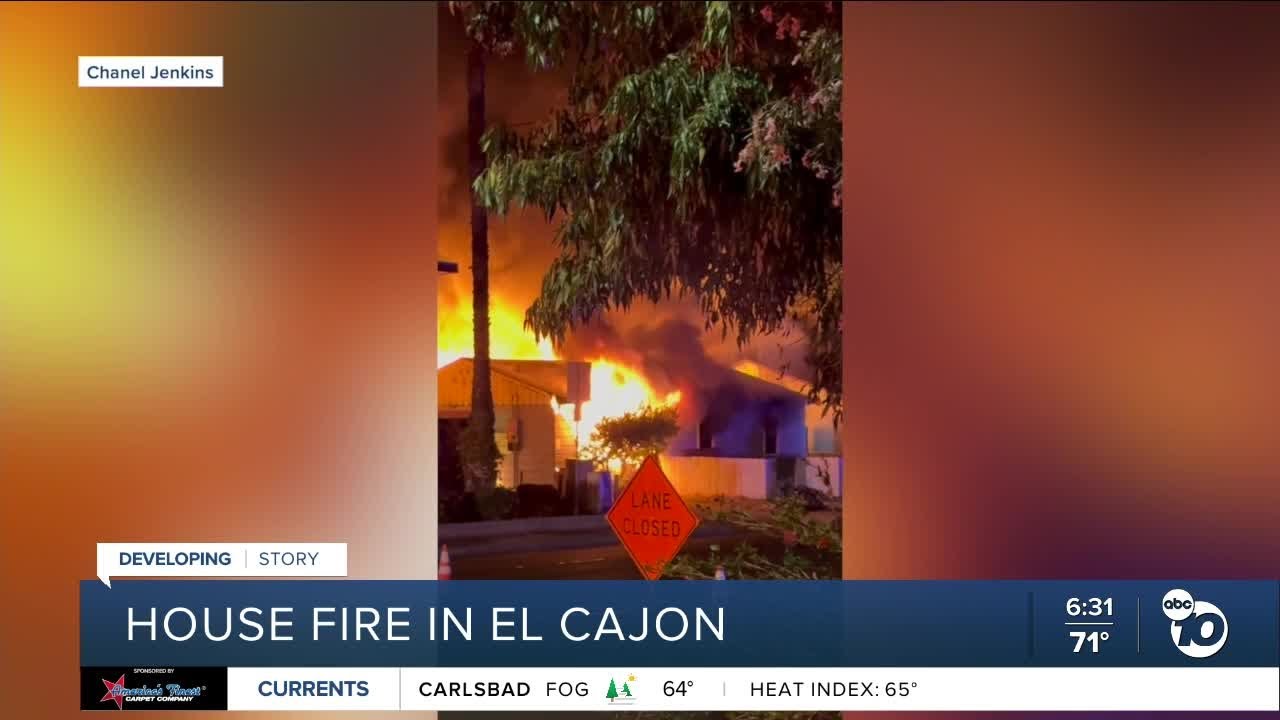 Fire burns home in El Cajon neighborhood - YouTube