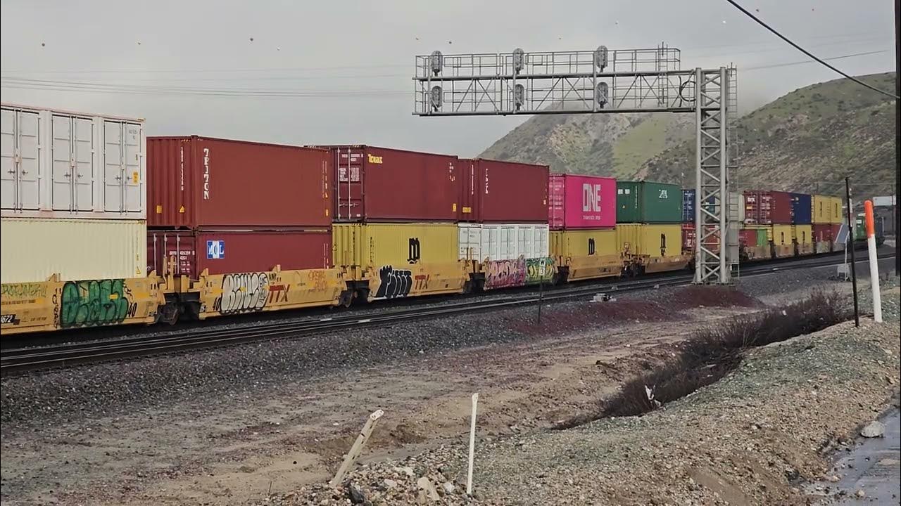 BNSF, Union Pacific and Amtrak Southwest Chief on Cajon Pass on 03/20/2023. Heritage Units ...