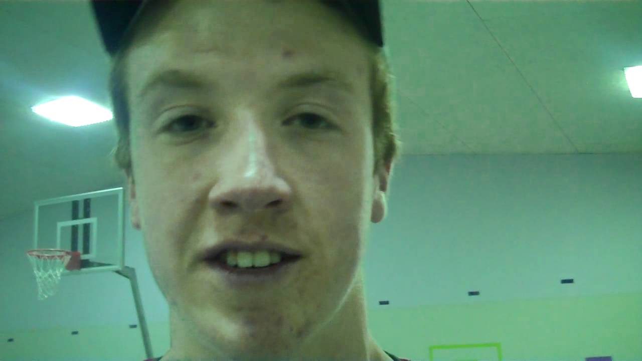 Michigan Warriors' CJ Murray helps out during 2011 holiday food drive ...