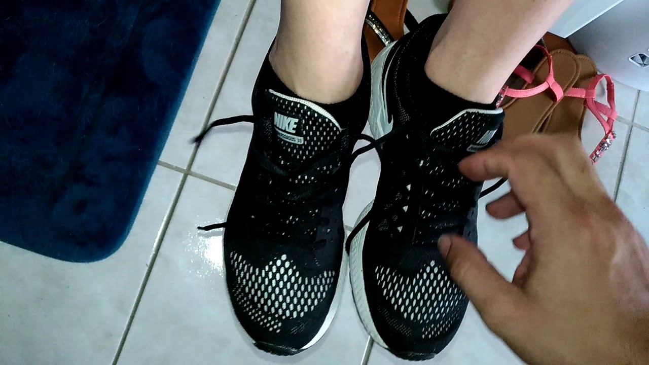 Taking off her black Nikes and socks after the gym - YouTube