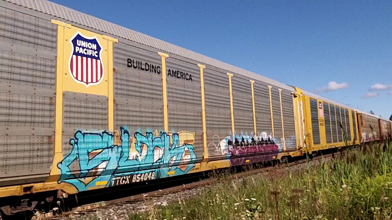 CN 271 w/ CN Engine 2283 Running Solo leads this 308 axle, WB Autorack ...