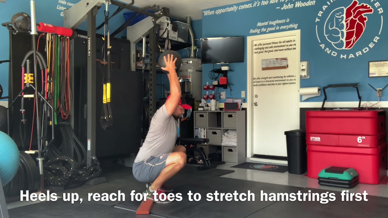 Heels Elevated Toe Touch to Squat with Medicine Ball - YouTube