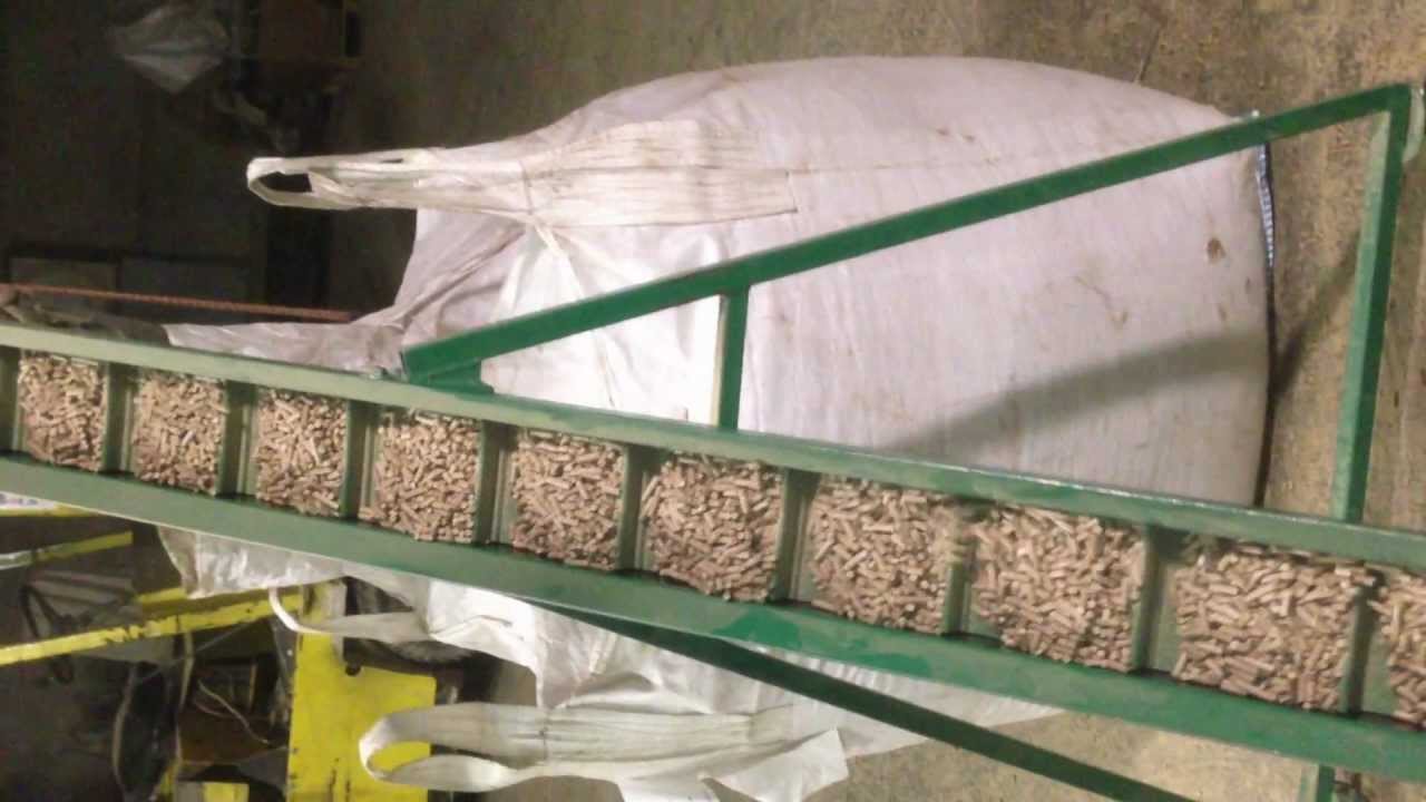 Wood pellets conveyor - YouTube