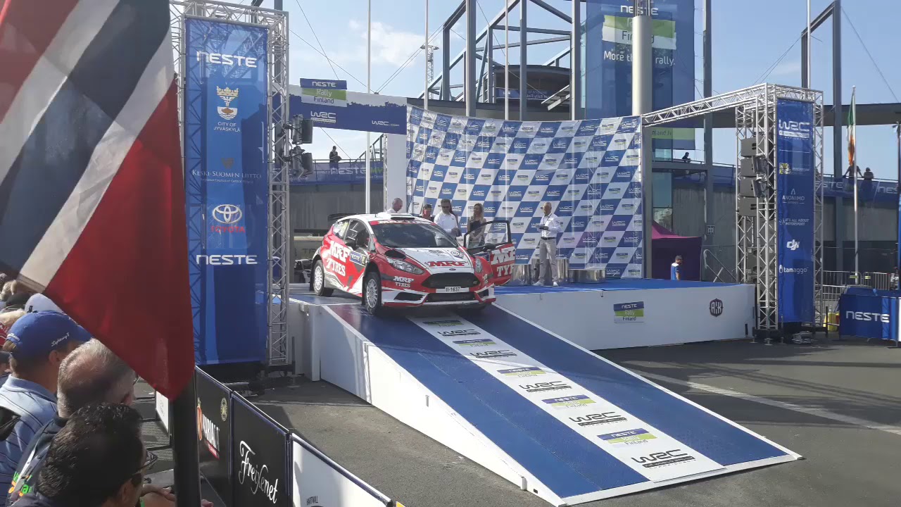 The MRF Tyres Rally team at the podium at WRC Italy - YouTube