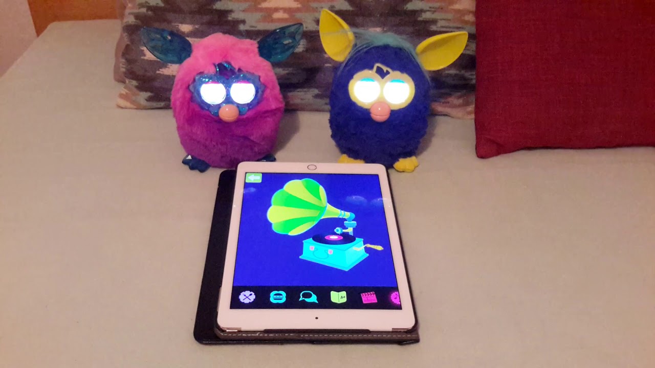 2 cute furbies are dancing and singing together - YouTube