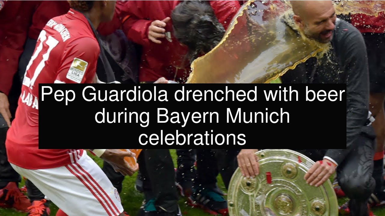 Pep Guardiola drenched with beer during Bayern Munich celebrations ...