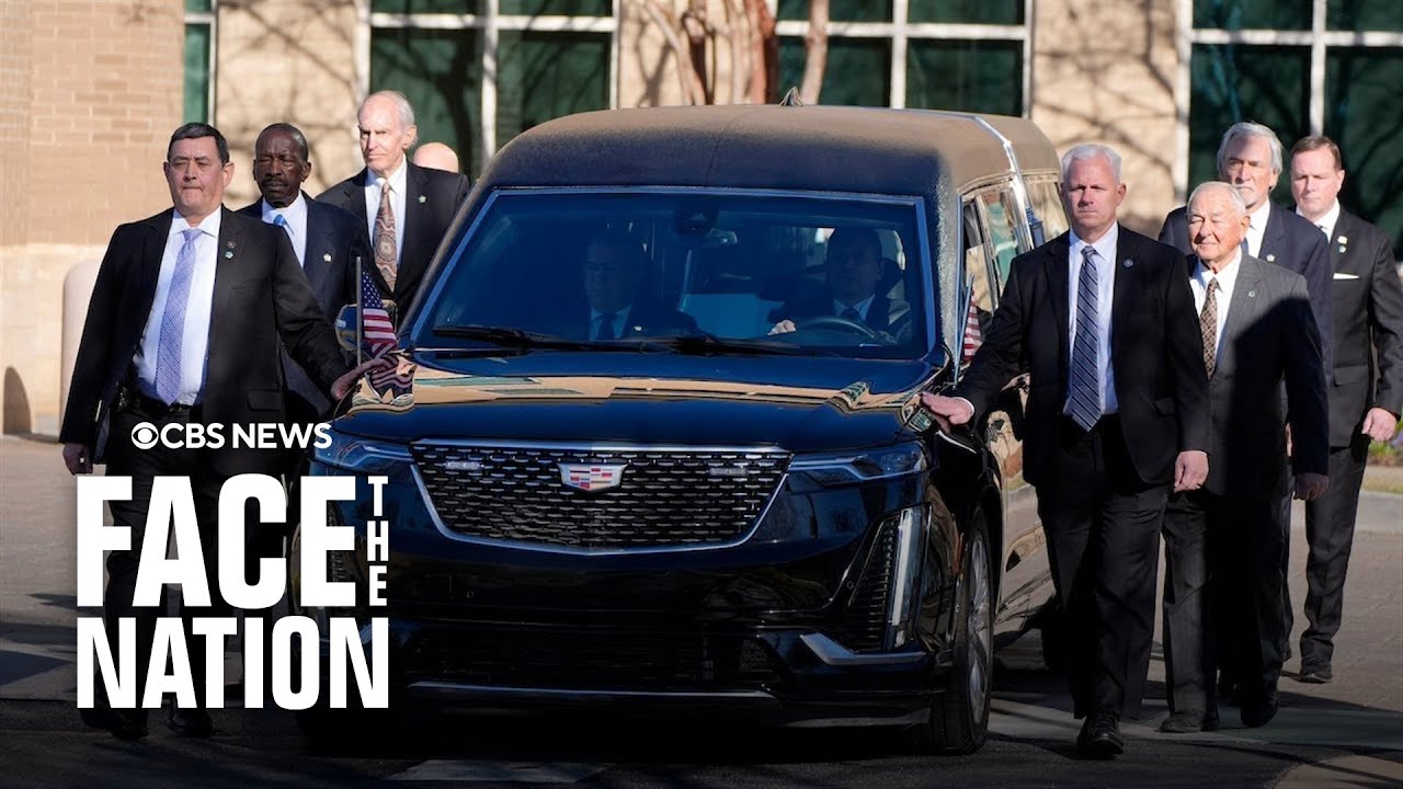 Secret Service agents walk alongside hearse carrying Jimmy Carter's ...