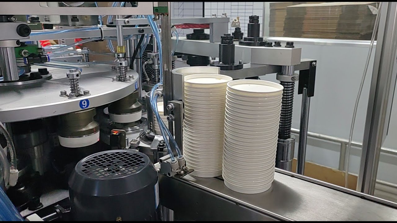 PL125 paper lid forming machine running in customer's workshop for ...