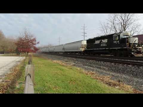 Solo Norfolk Southern Covered hopper train going through Olmsted Falls, Ohio on December 7, 2023 ...