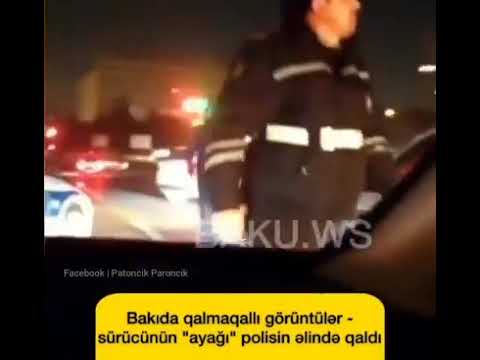 Bakida yol polisi ile surucu qarsidurmasi.