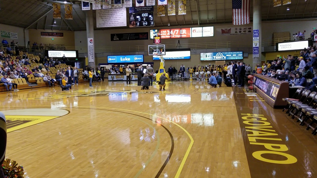 Homer Drew banner is put into the rafters at the ARC at Valpo - YouTube