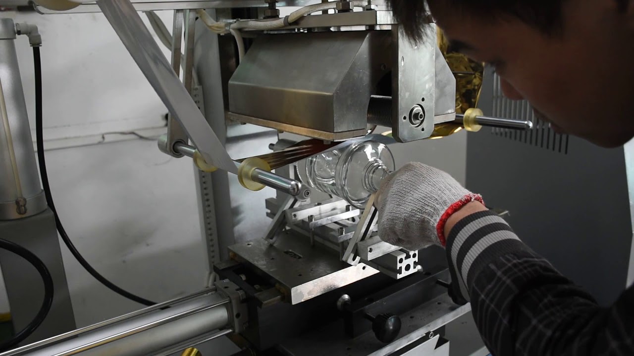 Manual Round glass Bottle hot stamping machine 2B - YouTube