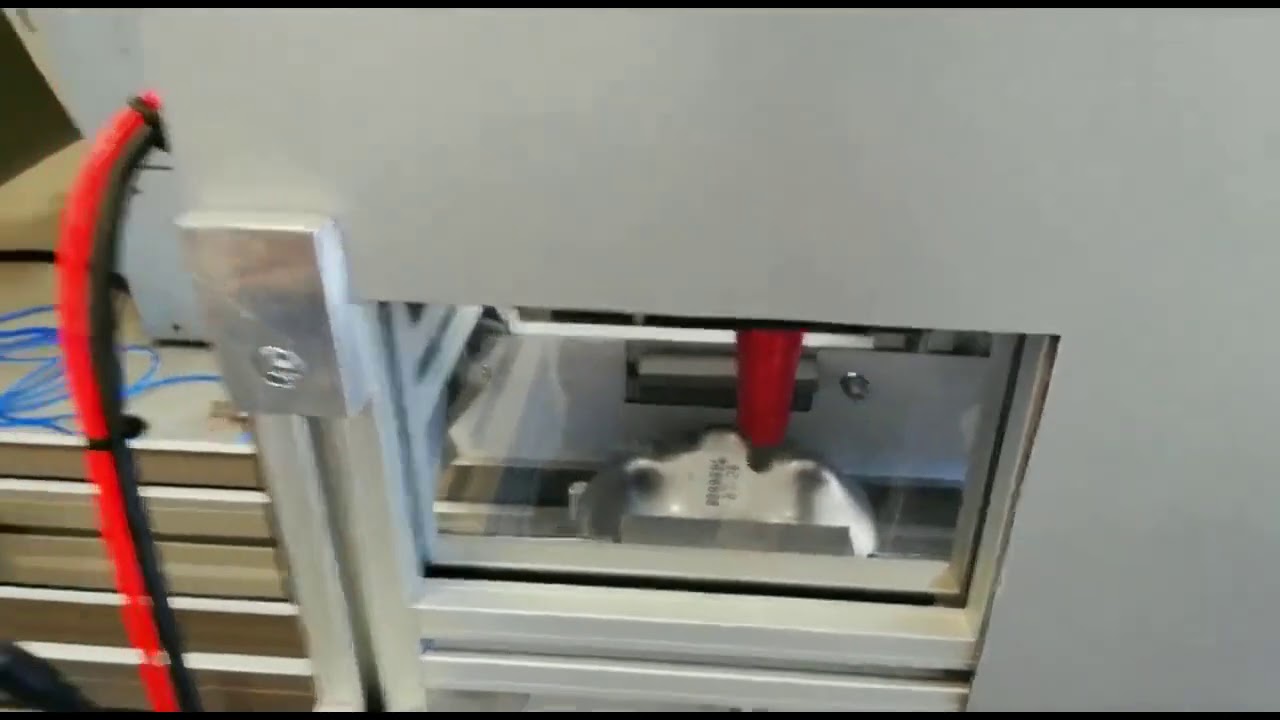 Production line-integrated ADP machine marking on fire estinguisher ...