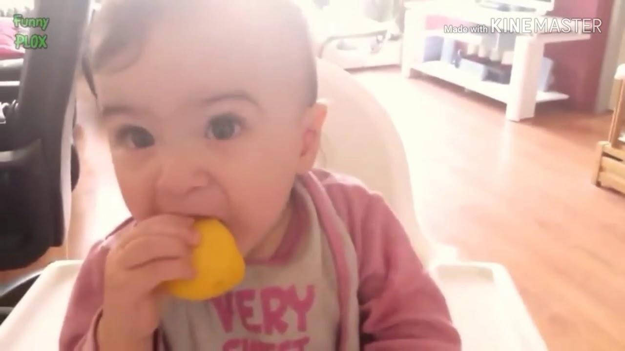 Funny faces of baby after having lemon - YouTube