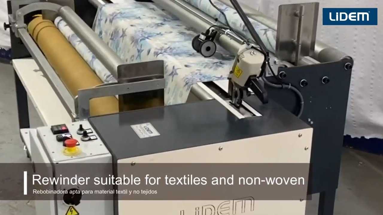 Fabric rewinding machine with tension control and meter programming ...