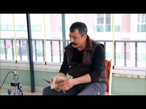 Alperen kekilli - Ahşap oyma Göktürk bayrağı çalışması