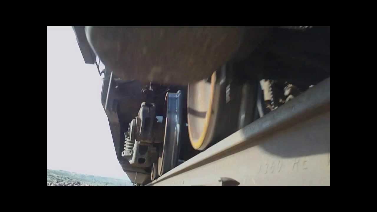 Under train on rail of BNSF 7822 - YouTube