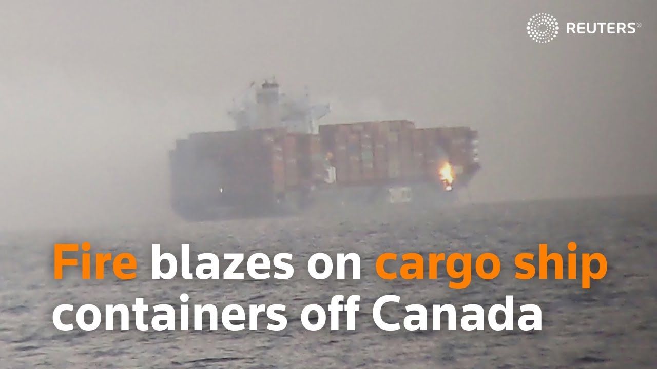 Fire blazes on cargo ship containers off Canada - YouTube