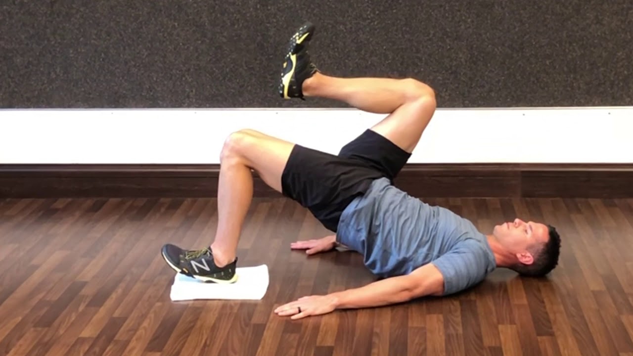 Single Leg Eccentric Slider Hamstring Curl - YouTube