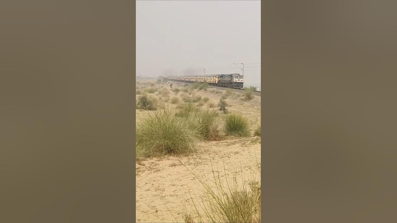 Train 19720 Suratgarh Jaipur Express crossing the Mighty Thar desert outskirts Bikaner - YouTube