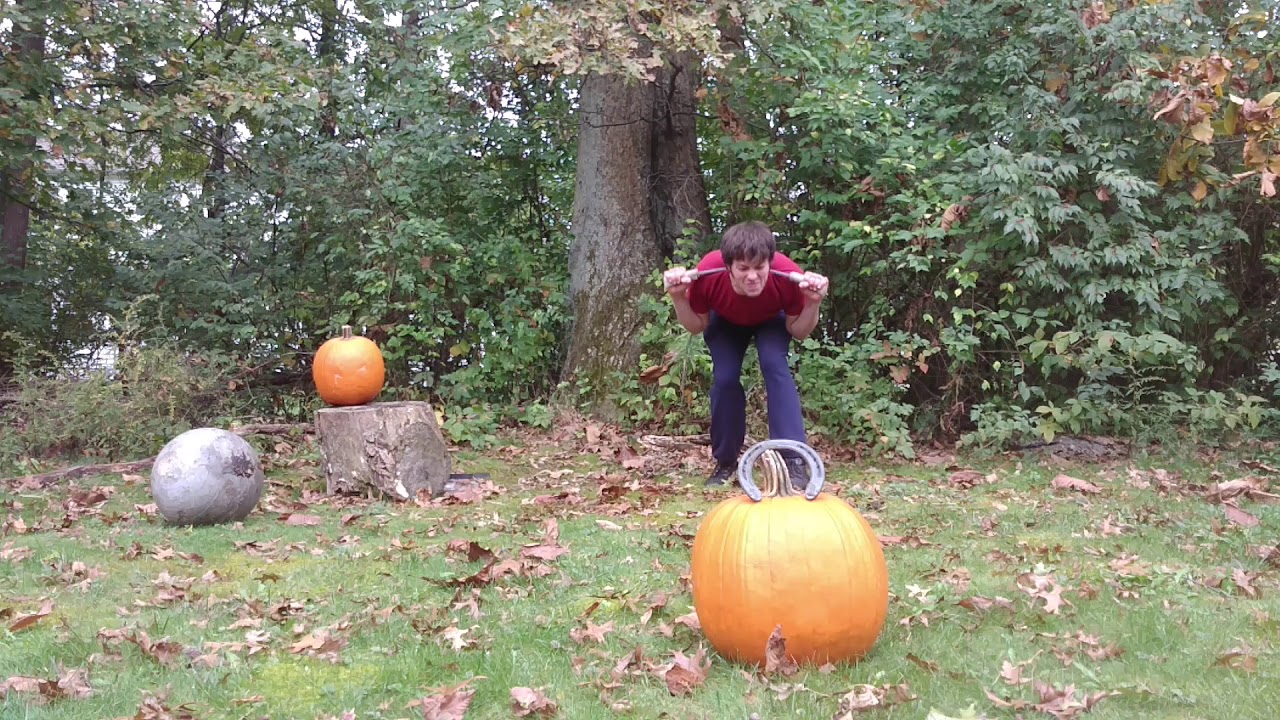 Bending steel bars around my neck - YouTube