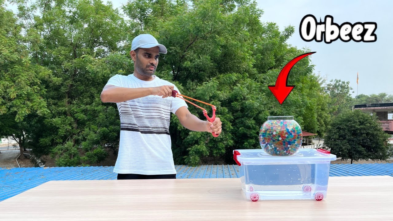Aim Slingshot in Slow Motion! - हमने Slingshot से ORBEEZ से भरा हुआ ...