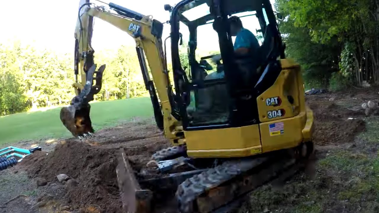 Final Cat 304 Video of the Year. Covering the Septic System! Cabin Build Ep. 16 - YouTube