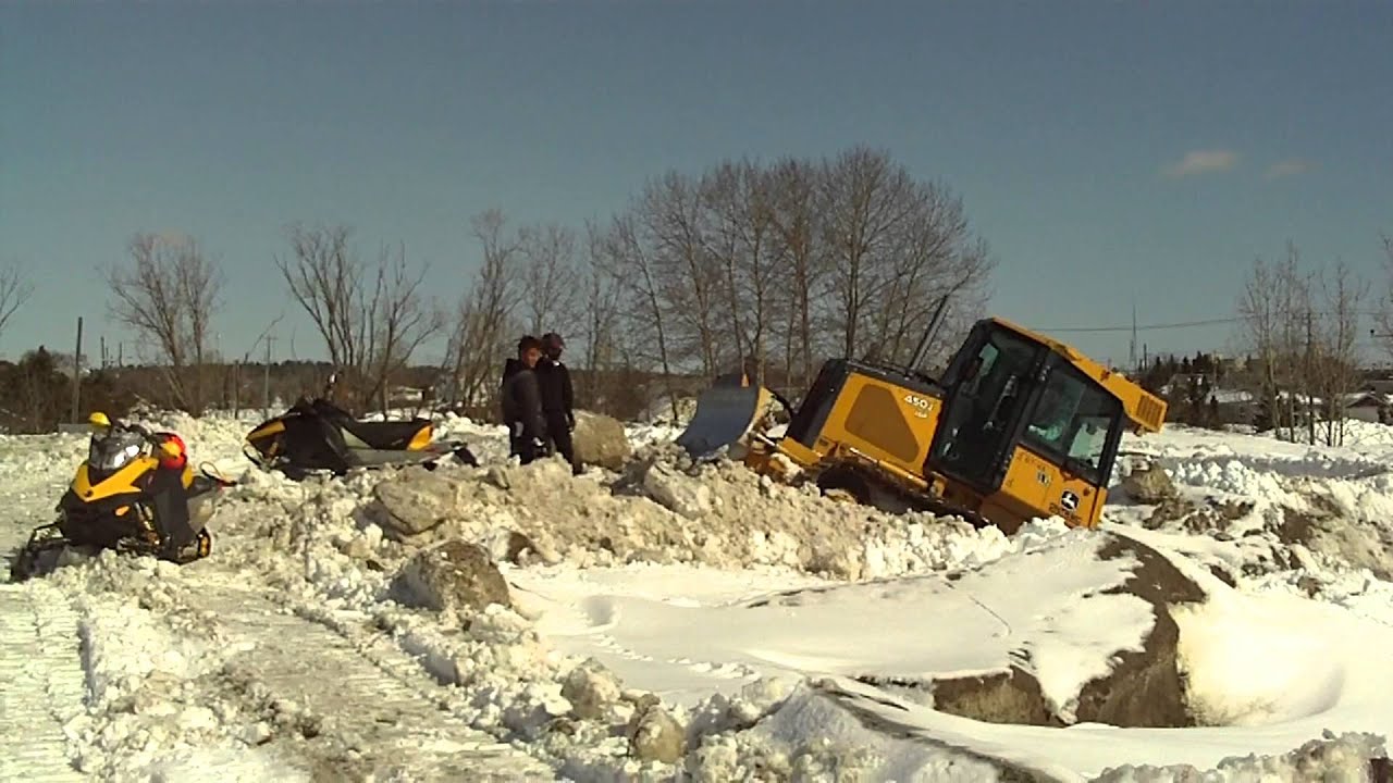 John Deere Bulldozer Snowmobile Jumps - YouTube