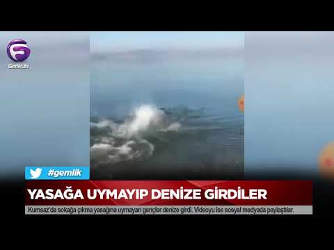 Gemlik'te sokağa çıkma yasağına uymayıp denize girdiler.